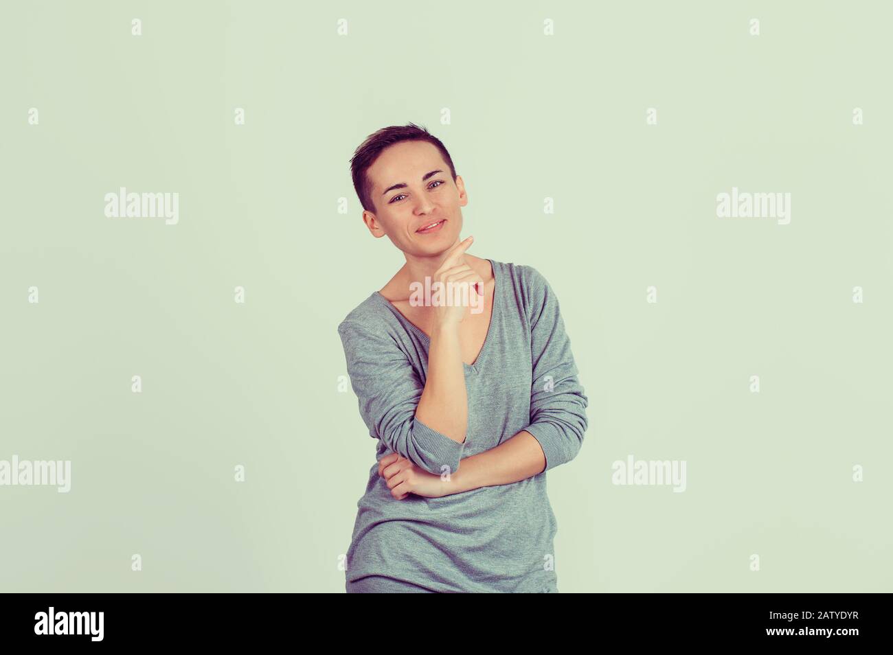 Independent and happy. Half length body woman short hair girl boy alike ...