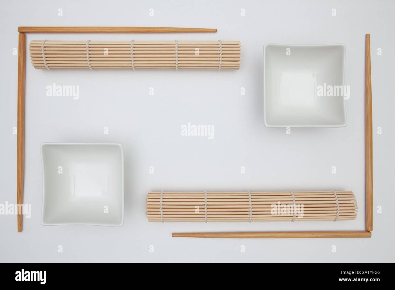 Top View Of White Empty Sushi Plates With Bamboo Chopsticks and Mats ...