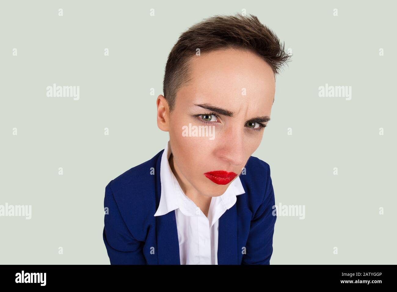 Funny skeptical. Closeup portrait doubtful grumpy annoyed young ...