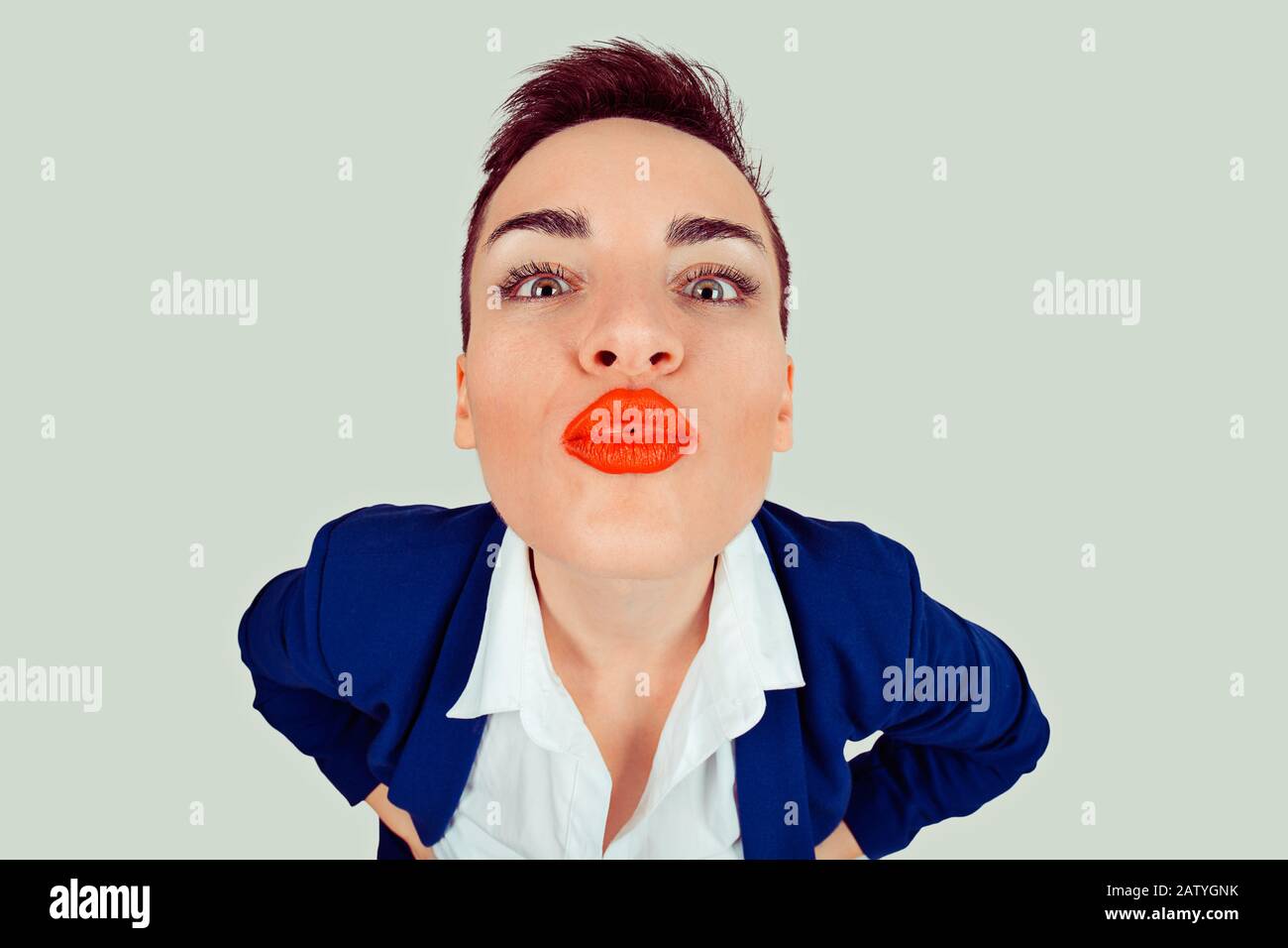 Closeup portrait of nerdy young funny distorted woman face with big red ...