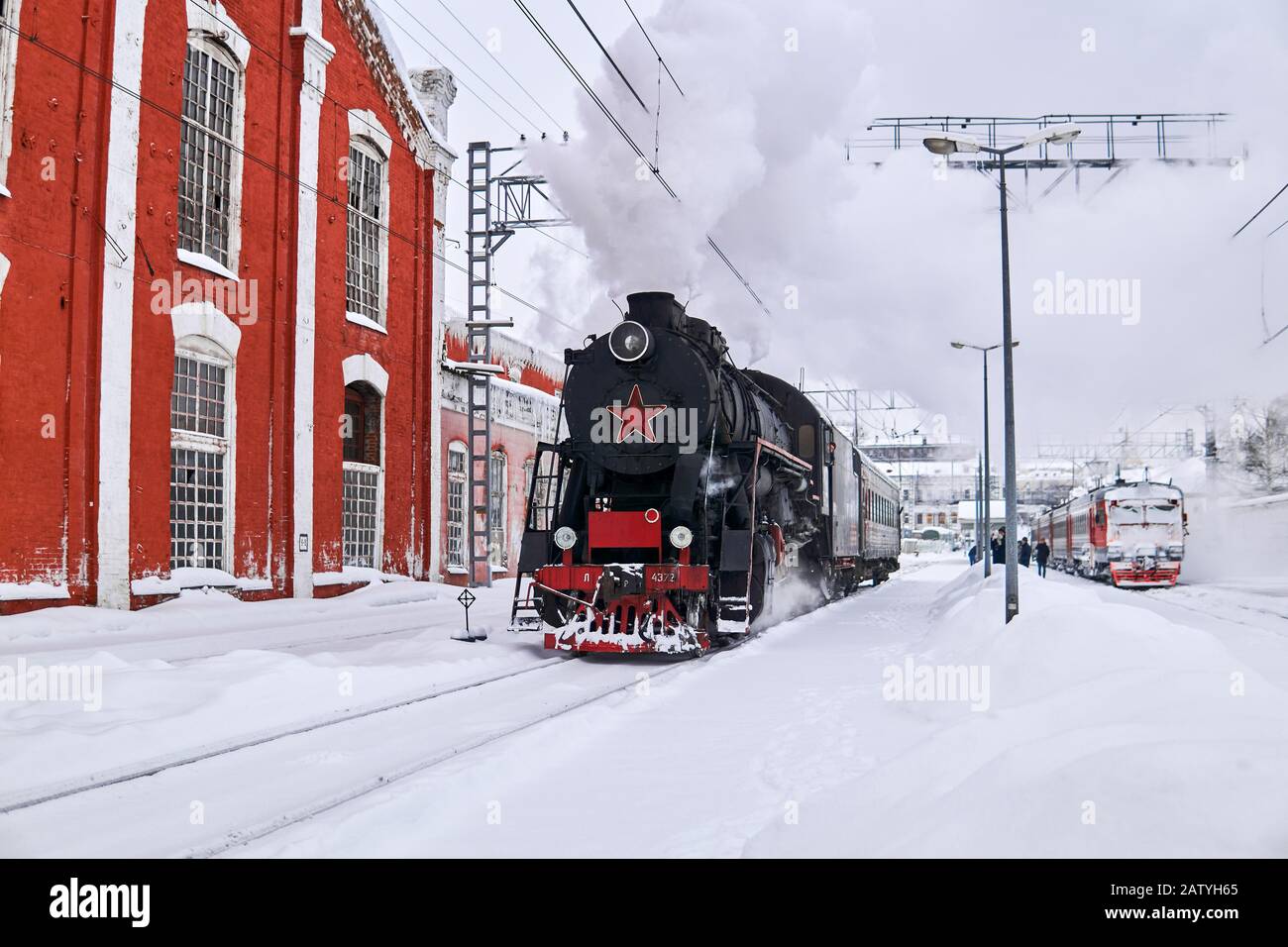 Perm, Russia - February 01, 2020: vintage steam locomotive passing ...