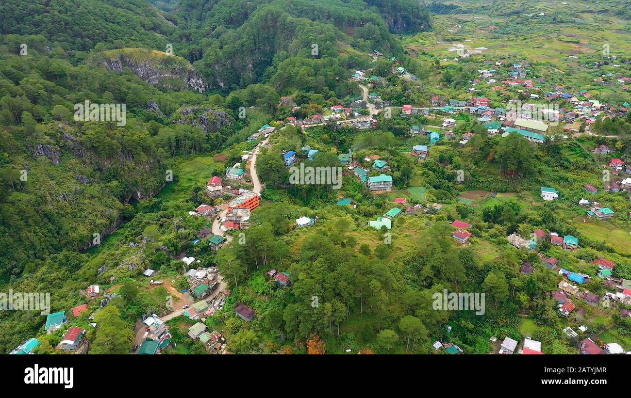 Houses and streets of a mountain town, top view. Aerial view town of ...