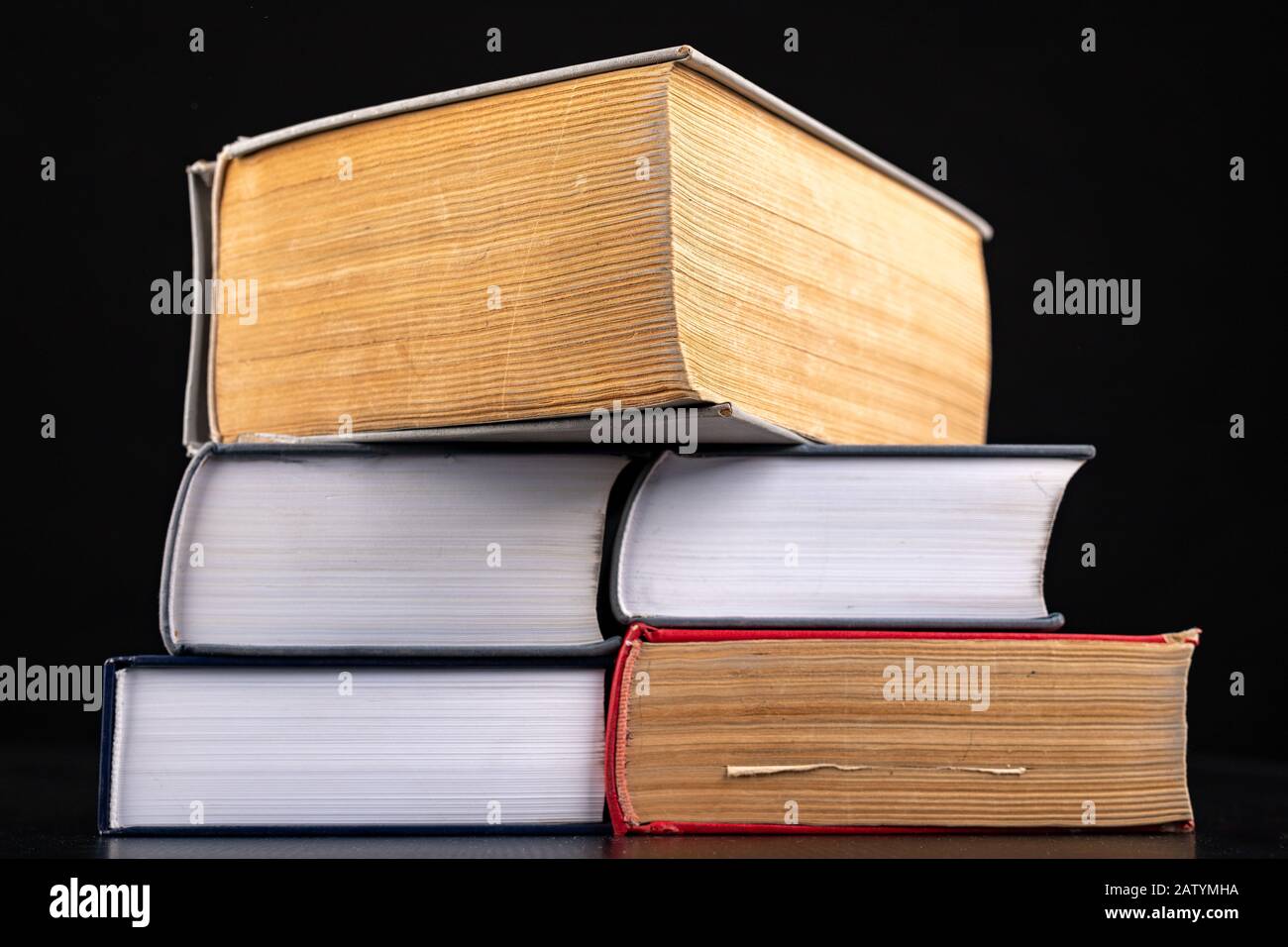 A pile of very thick and voluminous books. Enormous amount of knowledge ...