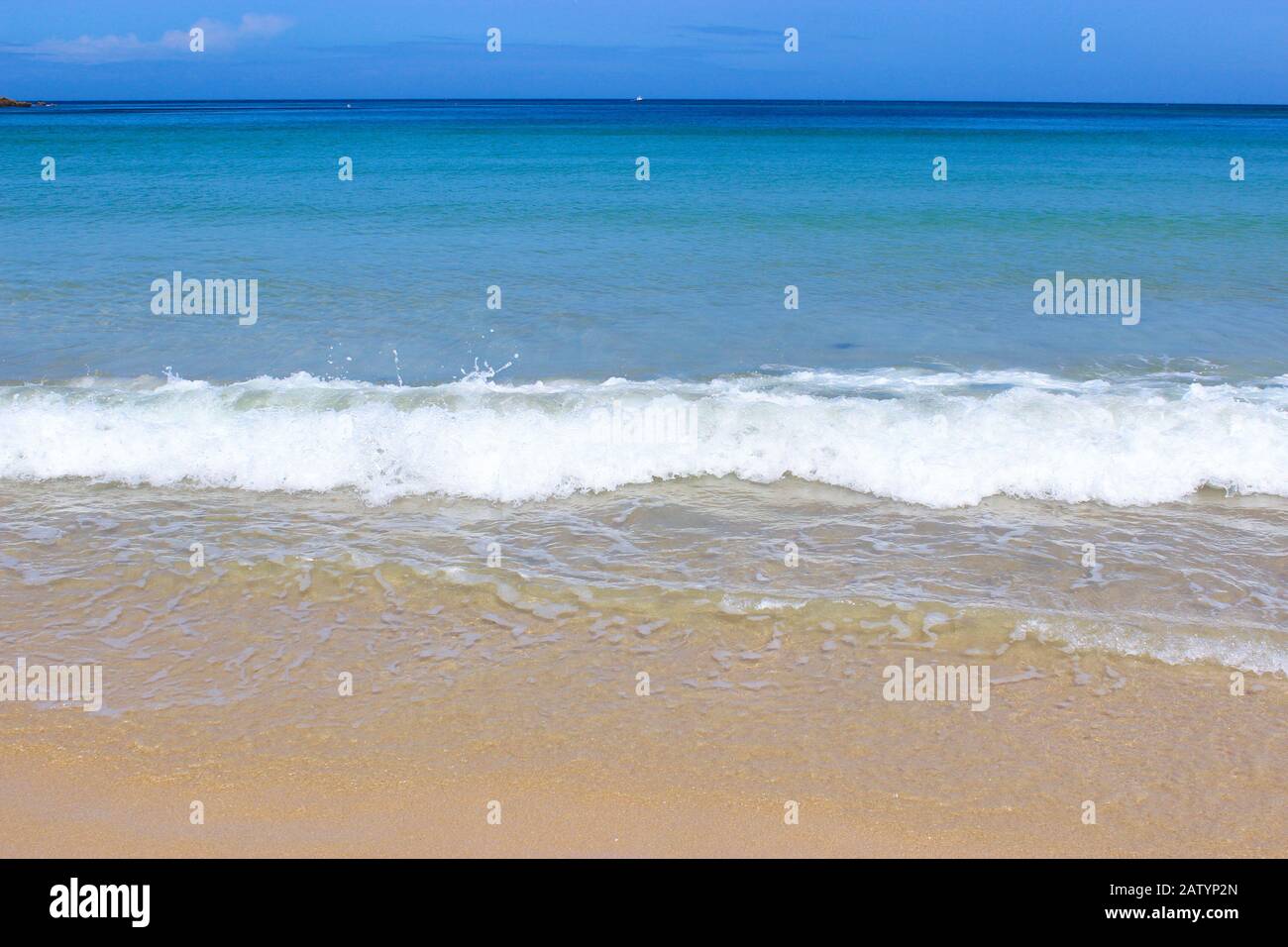 A tropical looking photo of a Cornwall beach and sea with beautiful ...