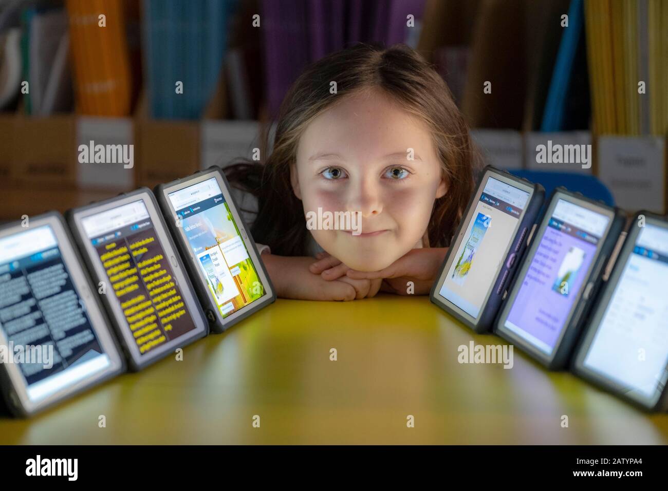 Primary School Children learning on-line Stock Photo - Alamy