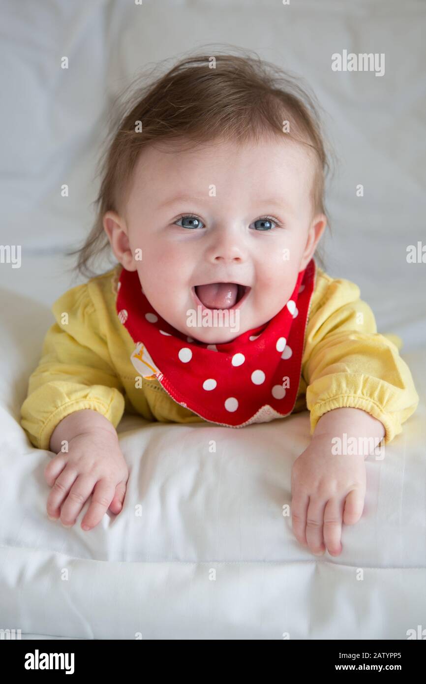 Portrait of a 6 month old baby girl Stock Photo - Alamy