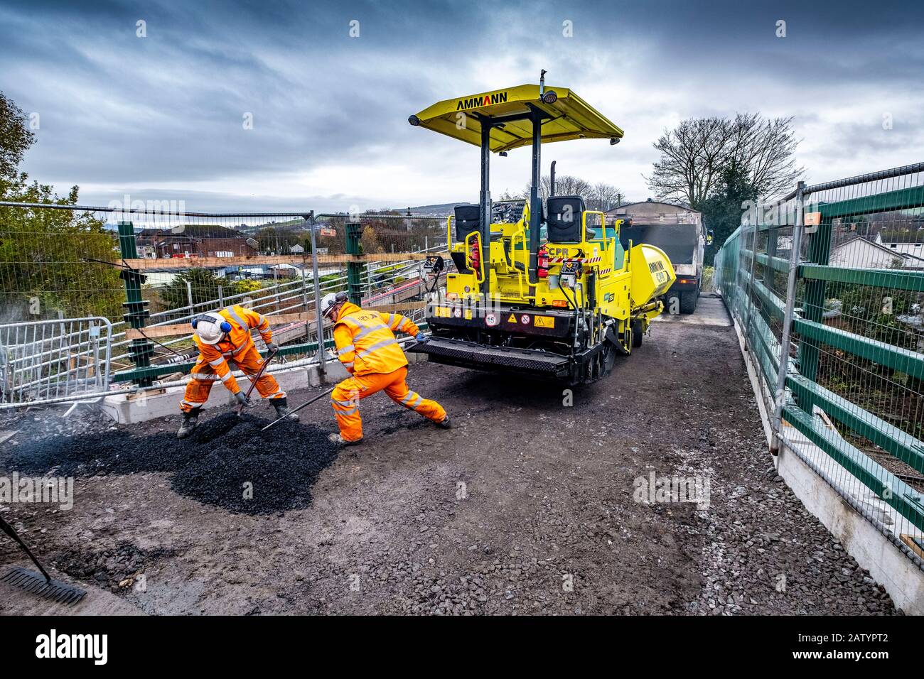 Laying a new road over a rail bridge Stock Photo - Alamy