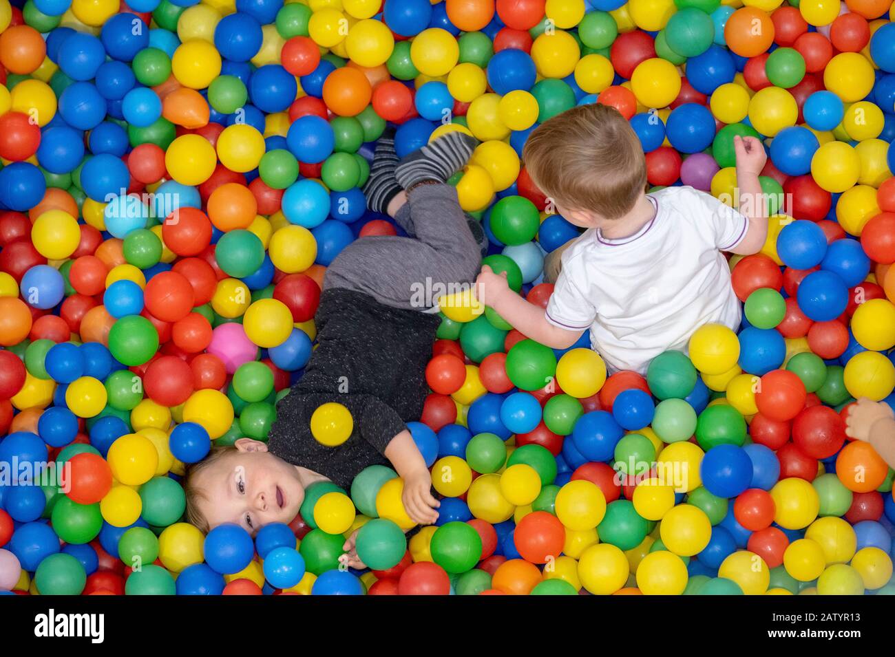 Children playing outside Stock Photo - Alamy