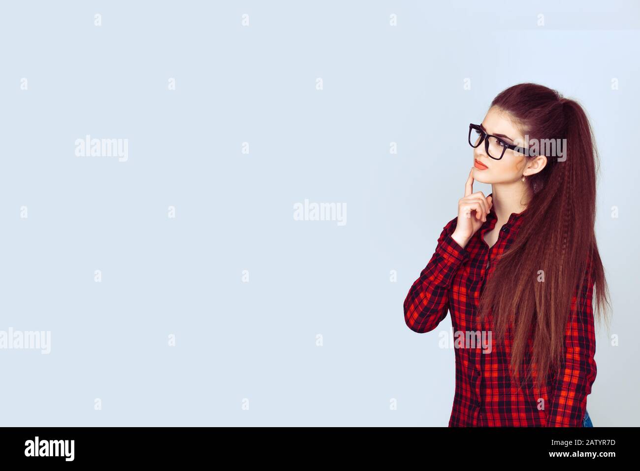 So many thoughts. Portrait happy beautiful woman thinking looking up ...