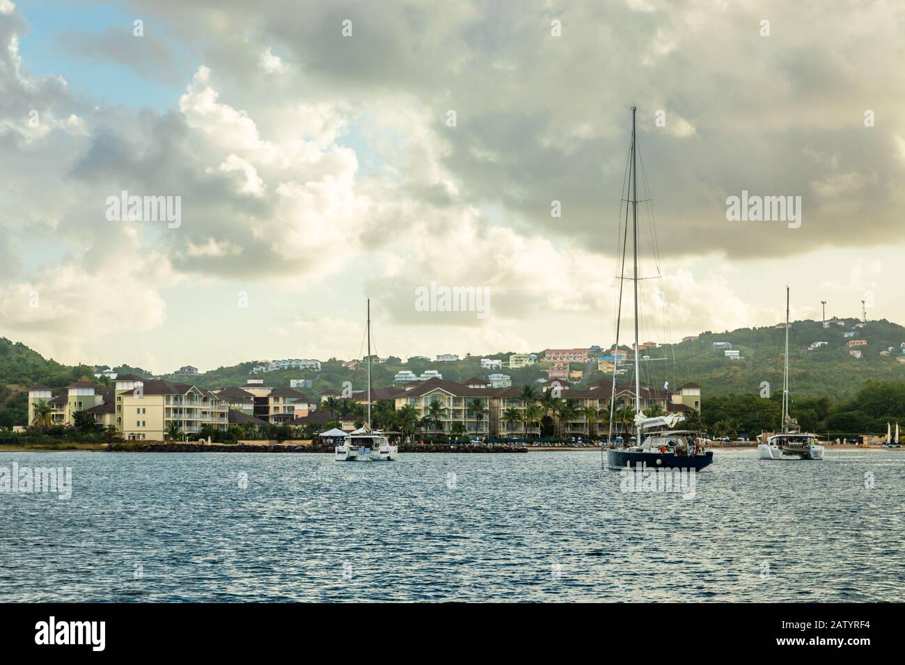Offshore view of Rodney bay with yachts anchored in the lagoon and rich ...