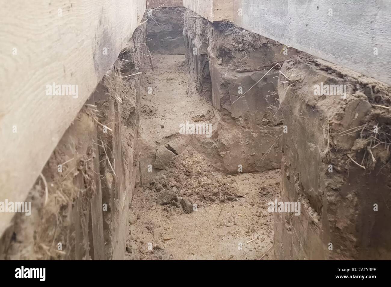 The foundation of the house. Building a house, digging the foundation ...