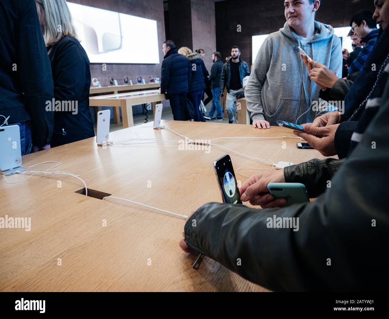Paris, France - Nov 3, 2017: Large group of customers admiring inside ...
