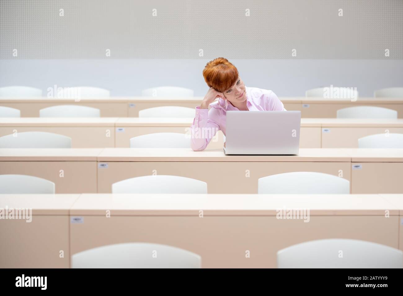 student think over a difficult task in the classroom after class Stock ...