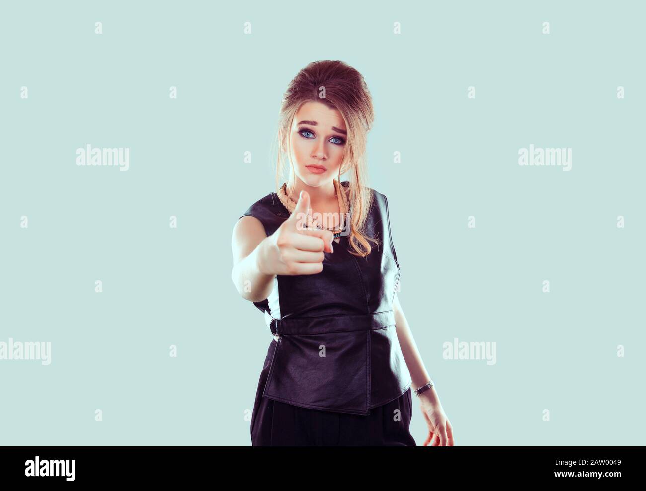 Shame on you. Portrait of an angry woman with finger pointing up with ...