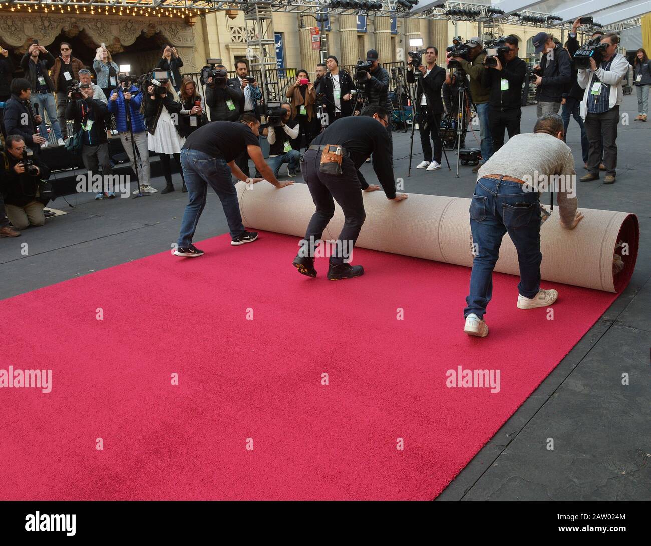 Los Angeles, United States. 05th Feb, 2020. Workers roll out the red ...