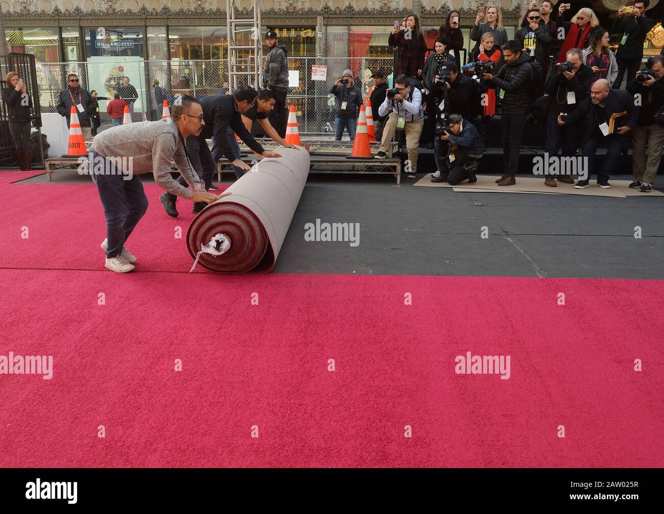 Los Angeles, United States. 05th Feb, 2020. Workers roll out the red ...