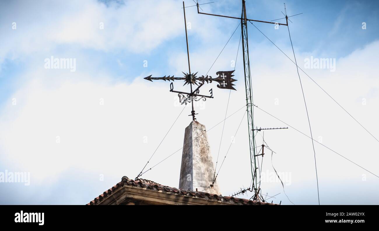 old typical weathercock weathervane on the roof of a Spanish house ...