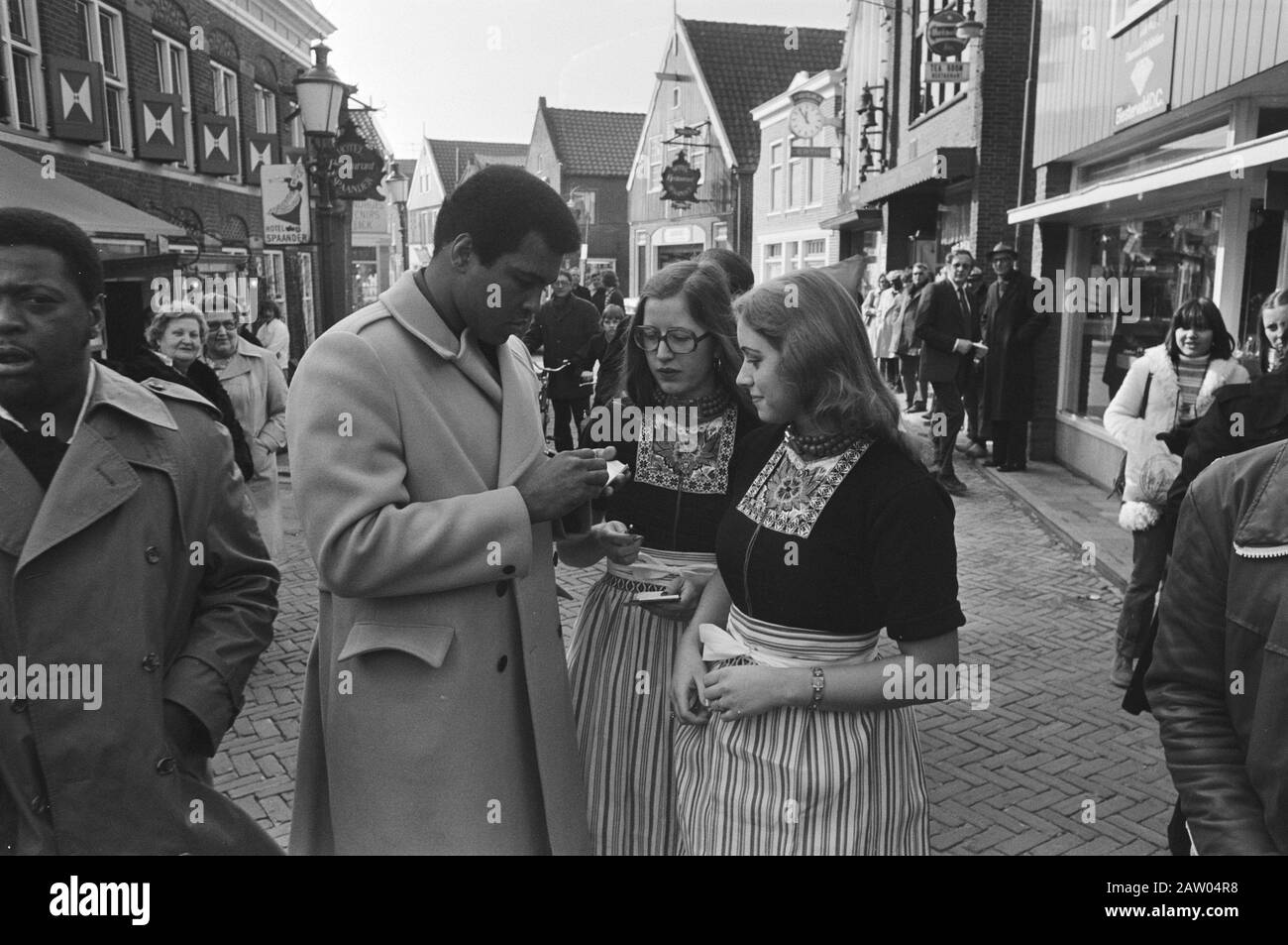 Muhammad Ali visits Volendam; Ali signs autographs at Volendam girls ...