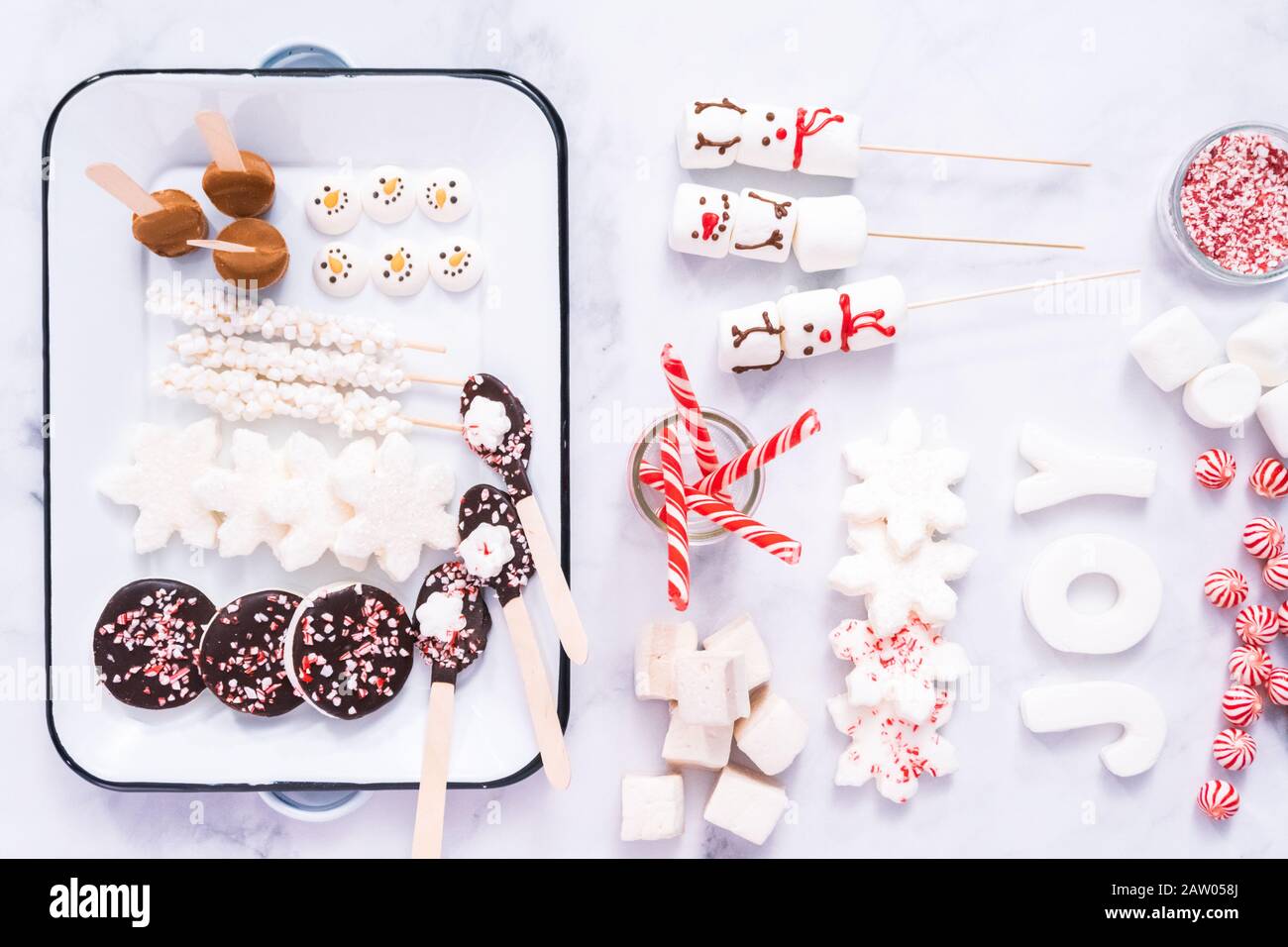 Flat lay. Variety of marshmallow toppings with peppermint and chocolate ...