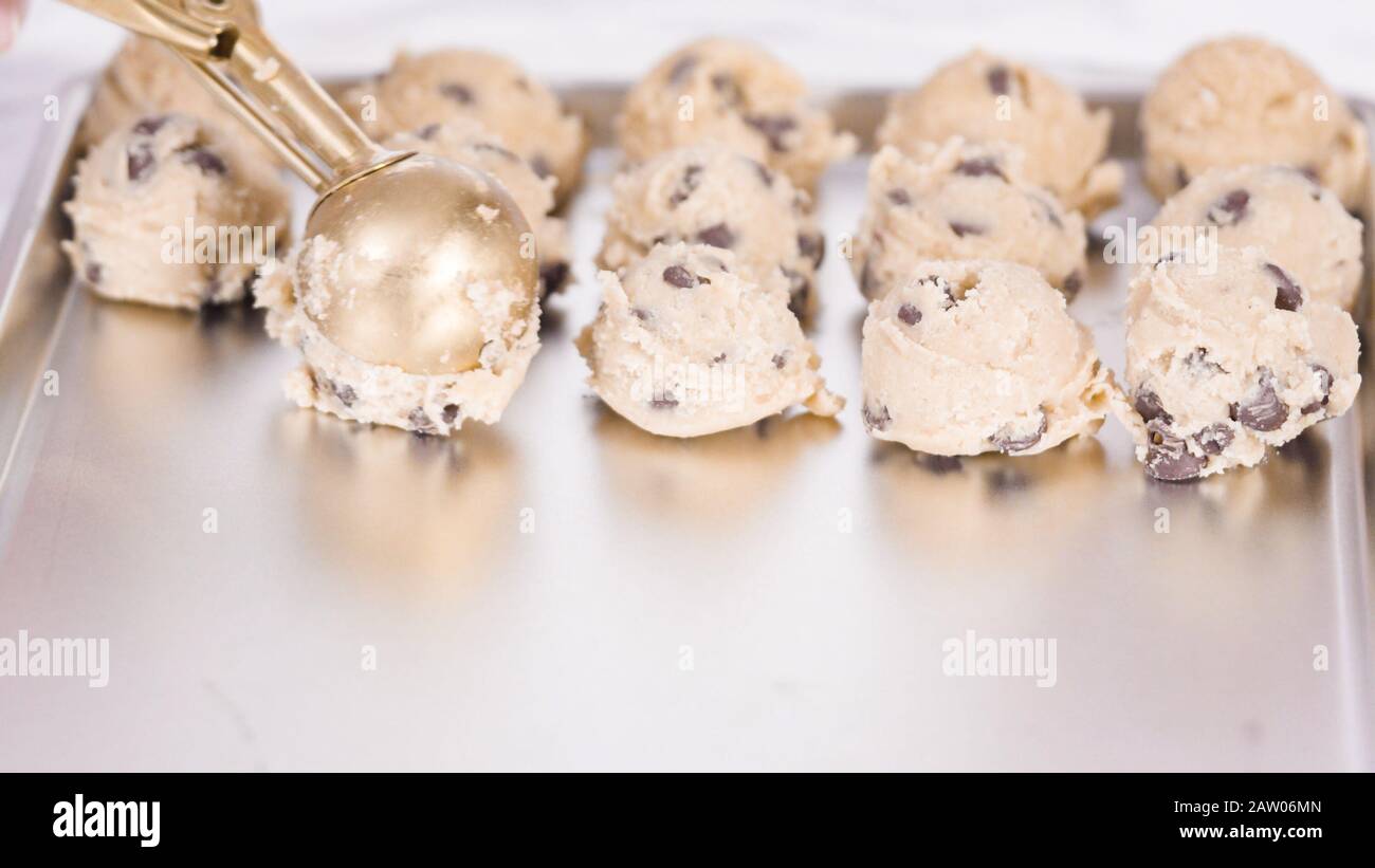 Step by step. Scooping homemade chocolate chip cookies with metal dough ...