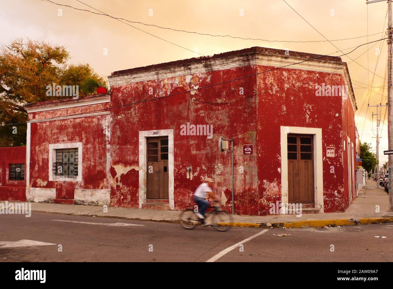 Wooden door in a typical colorful colonial building in Merida, Yucatan ...