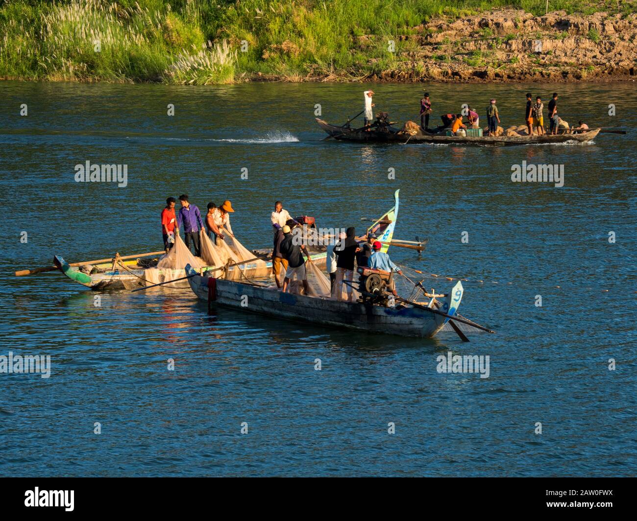 Small fishing boats with nets along the Mekong River in Cambodia Stock ...