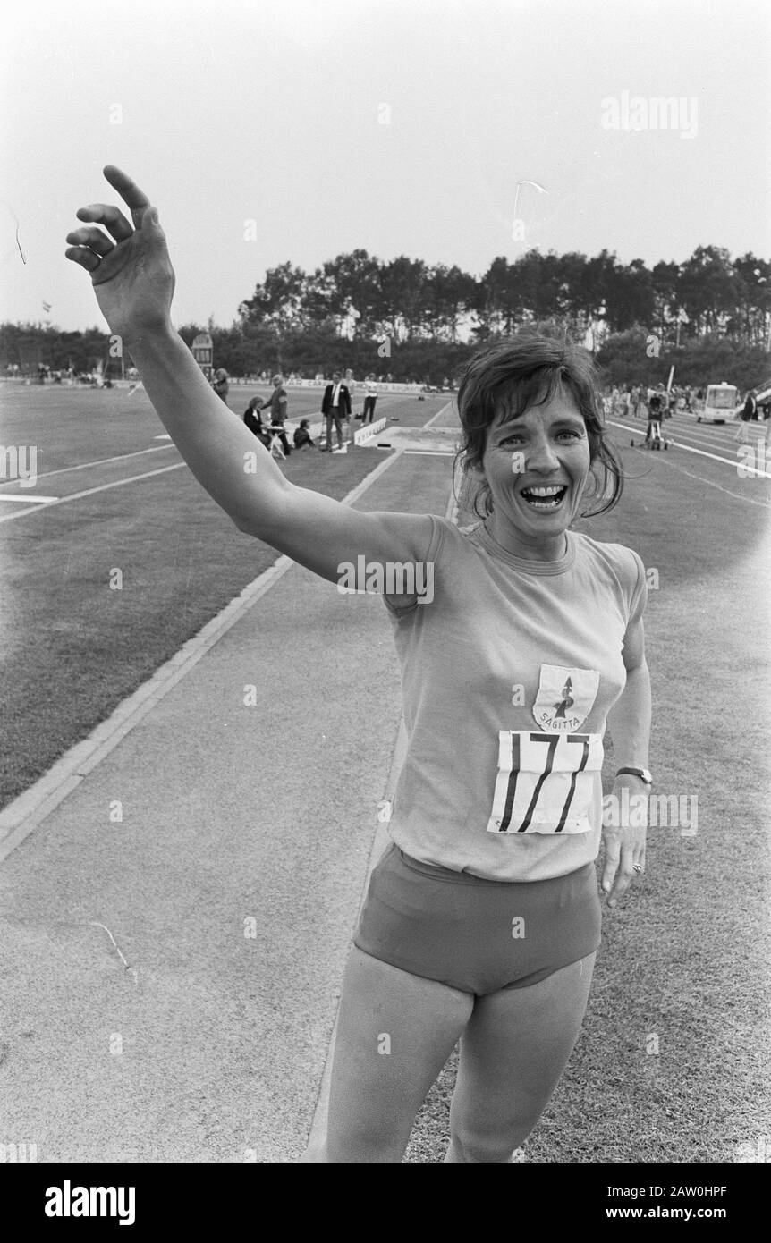 Dutch athletics championships in 1974 in Papendal; Ciska Janssen waving ...