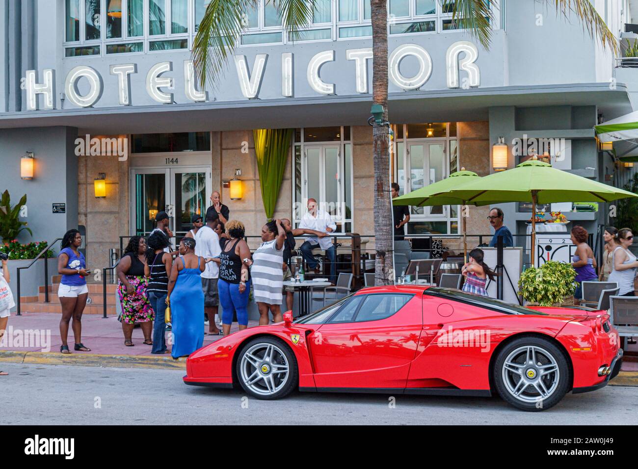 Red sports car on beach hi-res stock photography and images - Alamy