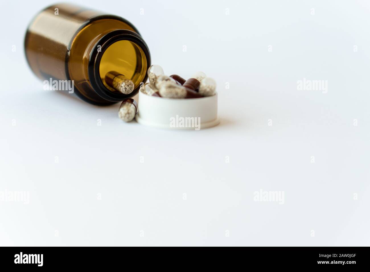 Medicine and pills. Medicines on a white background close-up. Brown ...