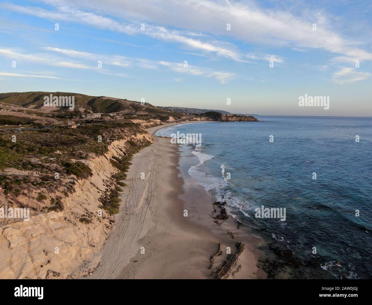 Aerial view of Newport Beach, cliff and beach during sunset twilight in ...