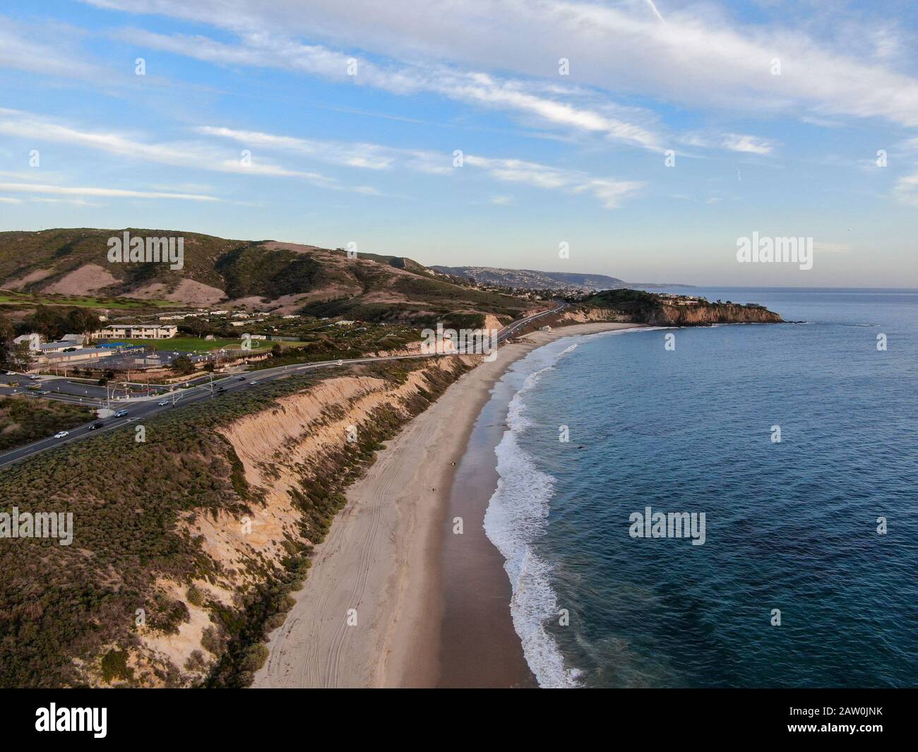 Aerial view of Newport Beach, cliff and beach during sunset twilight in ...