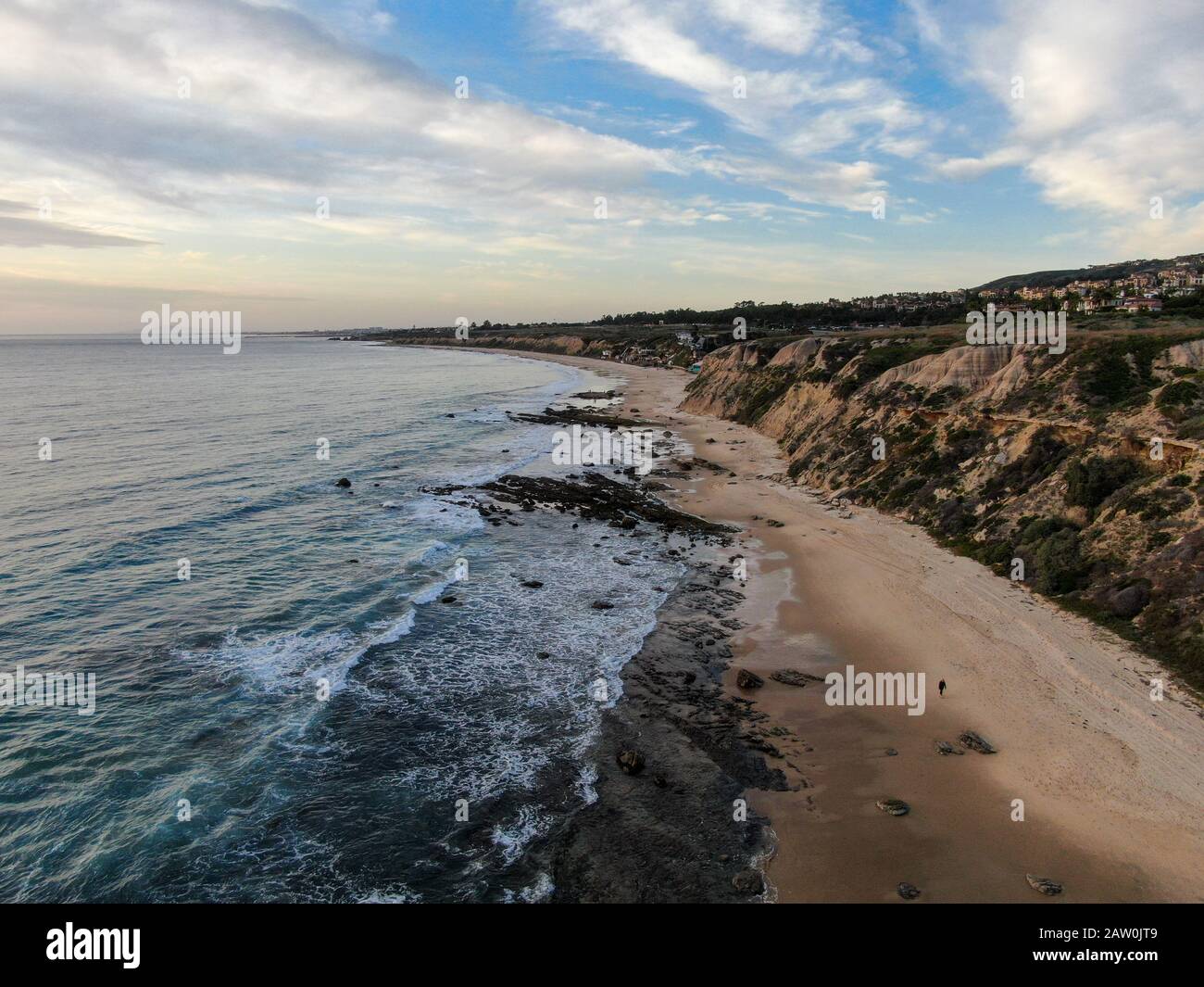 Aerial view of Newport Beach, cliff and beach during sunset twilight in ...
