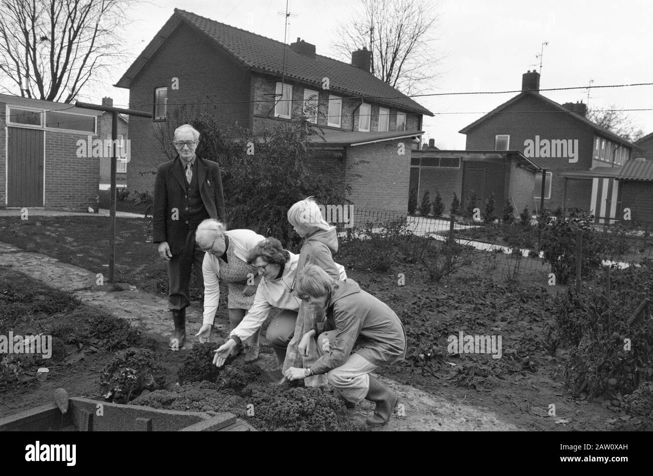 Oil Fountain in Schoonebeek (Drenthe); residents in their black garden ...