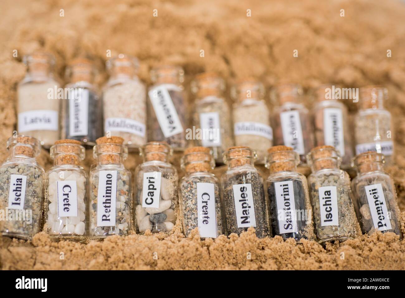 Glass test-tube with sand of different summer vacation countries Stock ...
