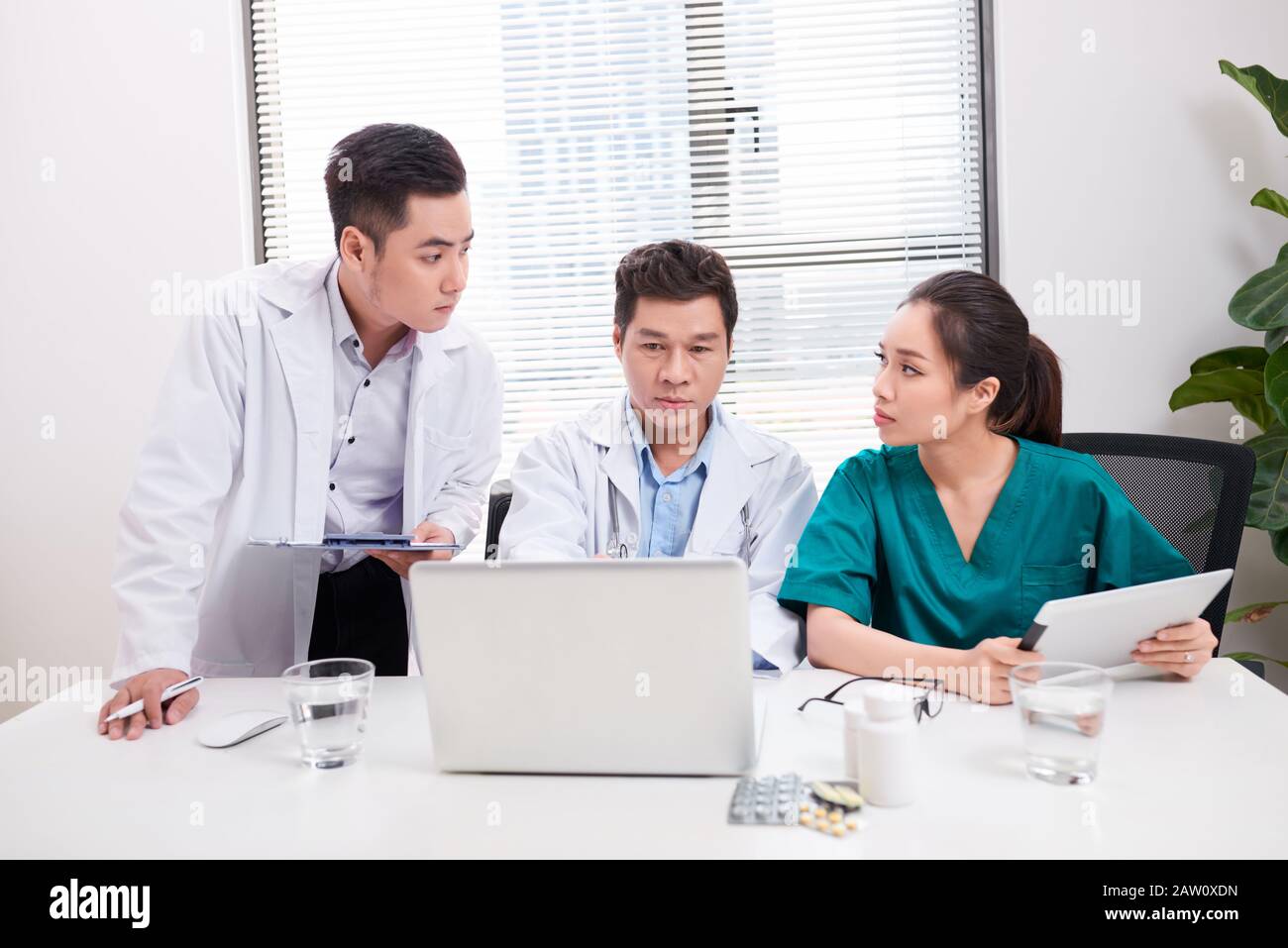 picture of young team or group of doctors working Stock Photo - Alamy