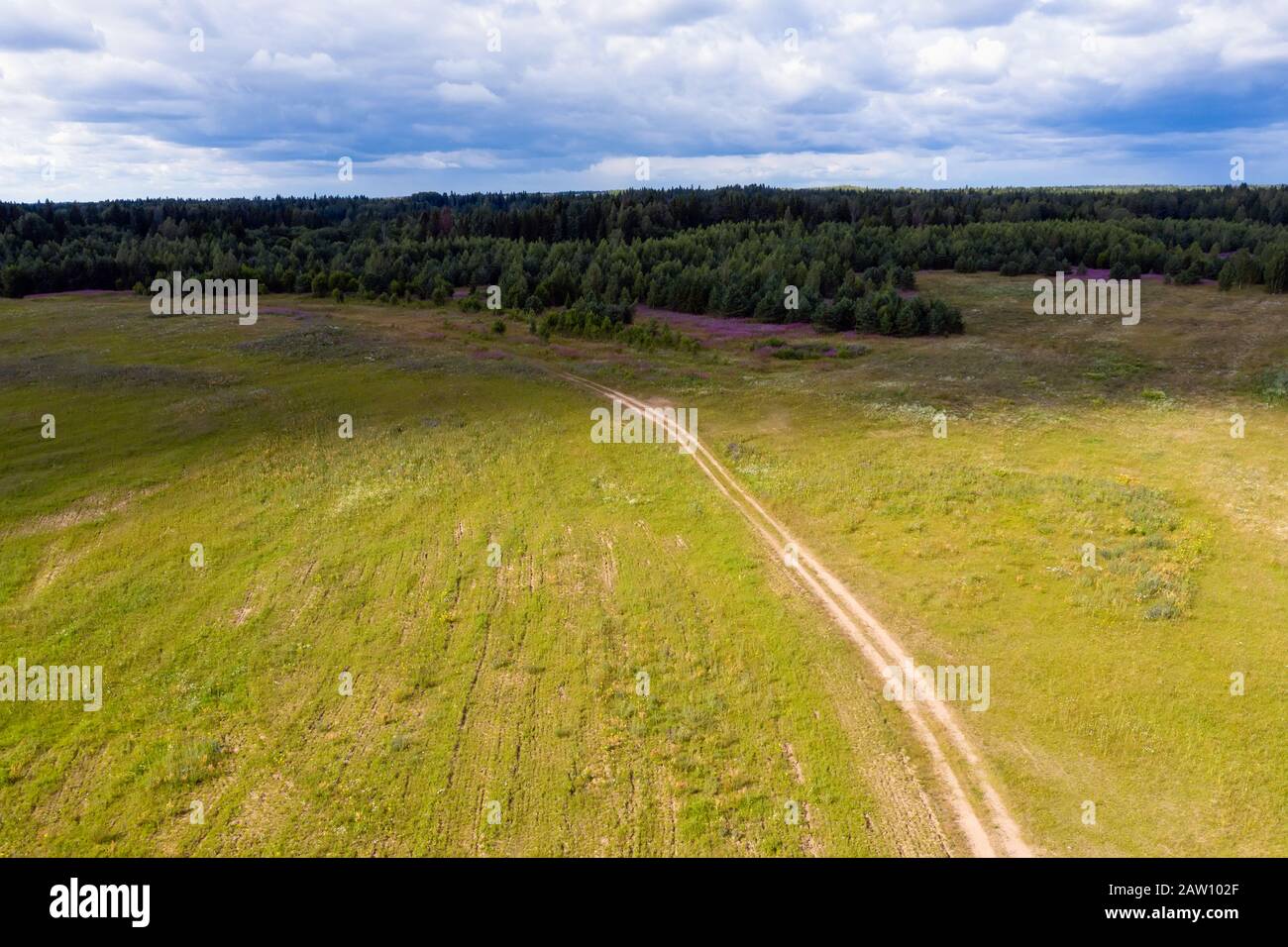 Top view of a country road through an agricultural area Stock Photo - Alamy