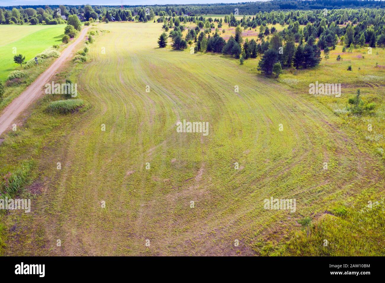 Top view of a country road through an agricultural area Stock Photo - Alamy