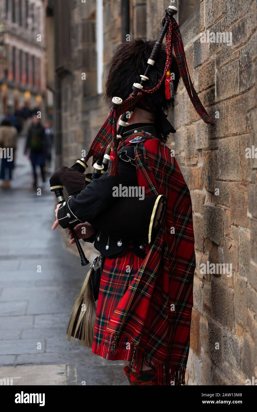 Man playing bagpipe in scottish traditional costume hi-res stock ...