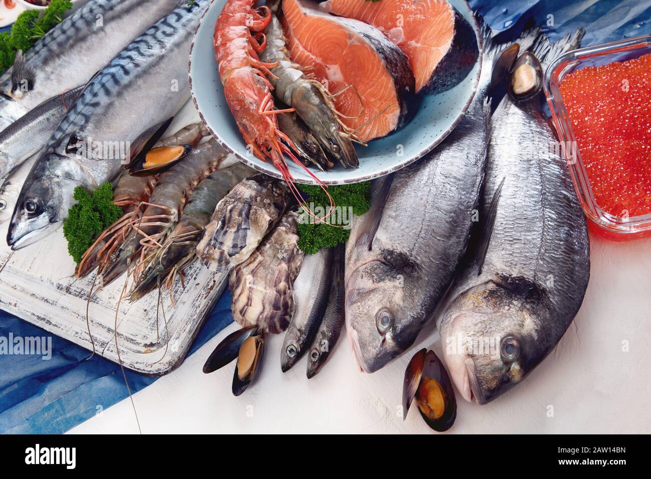 Fresh fish and seafood. Healthy diet eating concept Stock Photo - Alamy