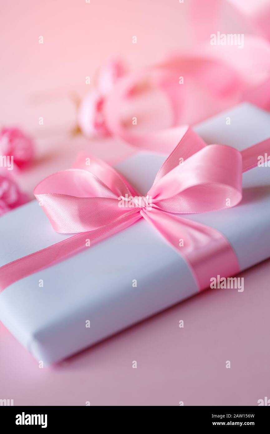 Decorative white gift box with pink bow and long beautiful ribbon Stock ...