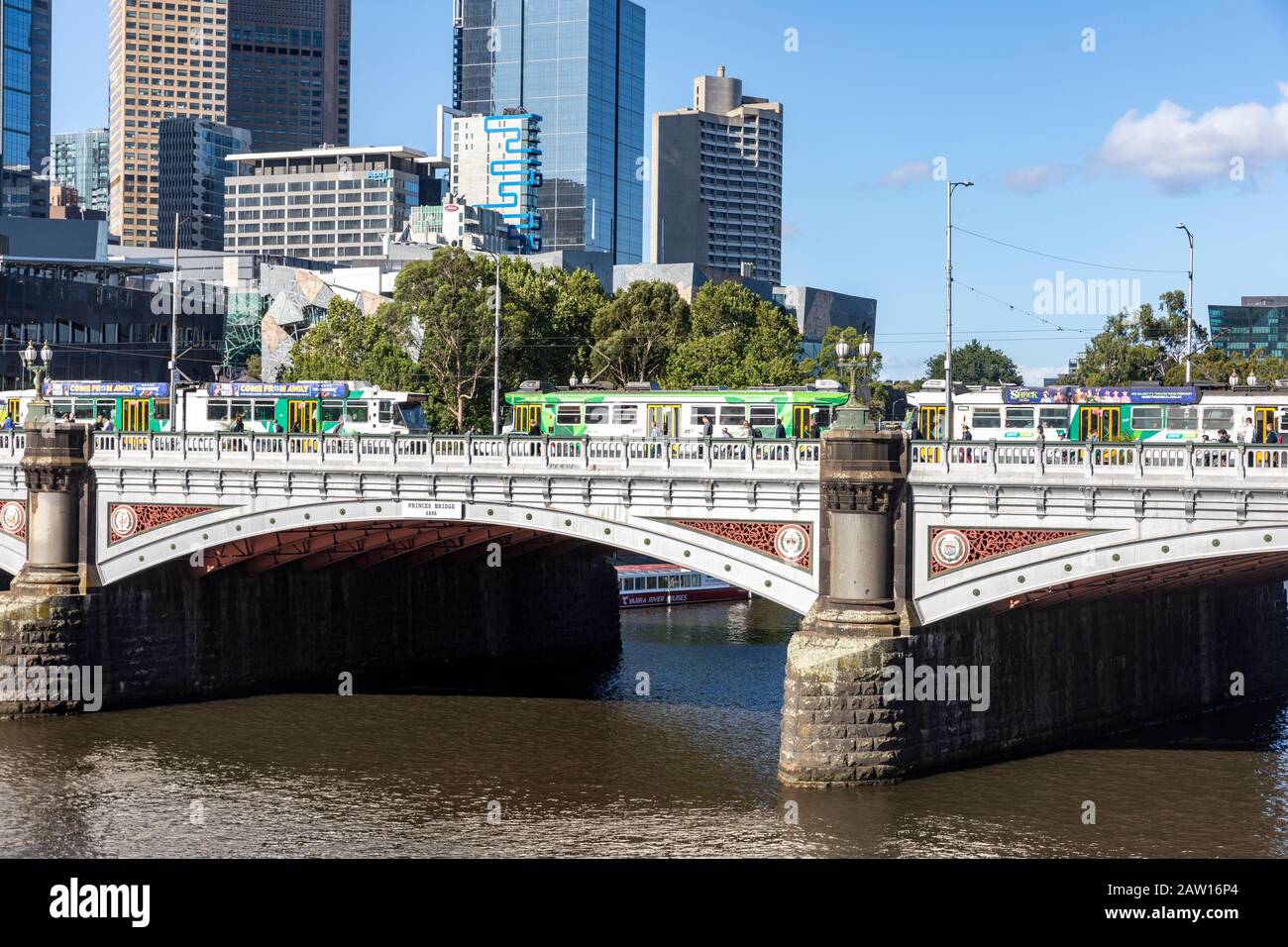 Melbourne tram on Princes bridge over the yarra river in Melbourne city ...