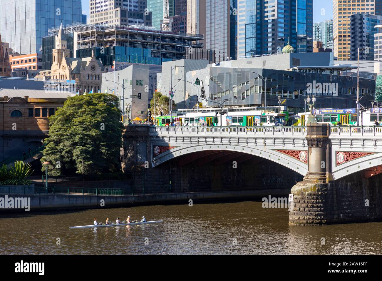 Melbourne yarra river and city centre, tram train crossing Princes ...