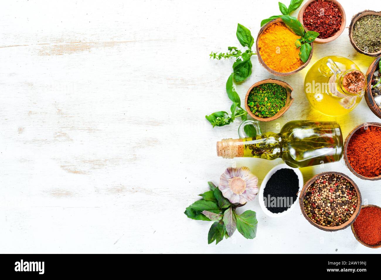 Various spices in a bowls on white background. Indian spices. Top view ...