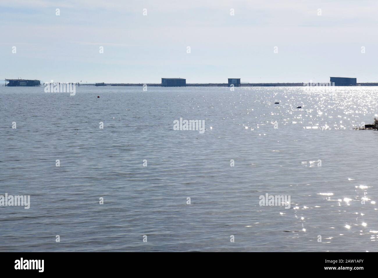 Fishing and mussel farms in the estuary of Axios river, gulf of ...