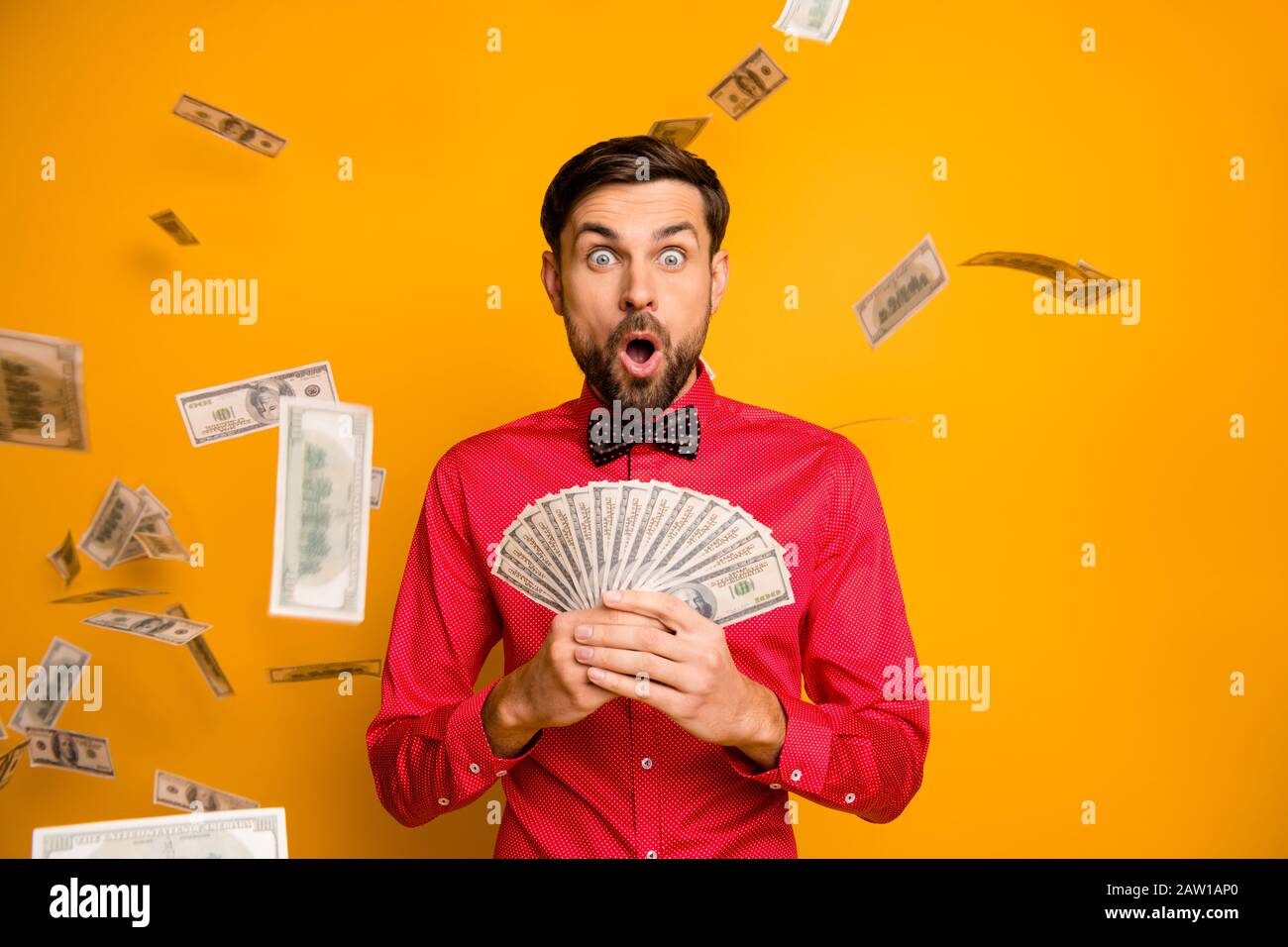 Photo of crazy funny guy hold fan of money bucks banknotes money ...