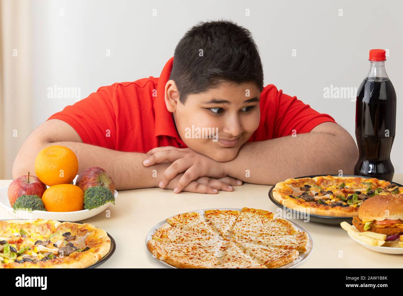 Fat child junk food hi-res stock photography and images - Alamy