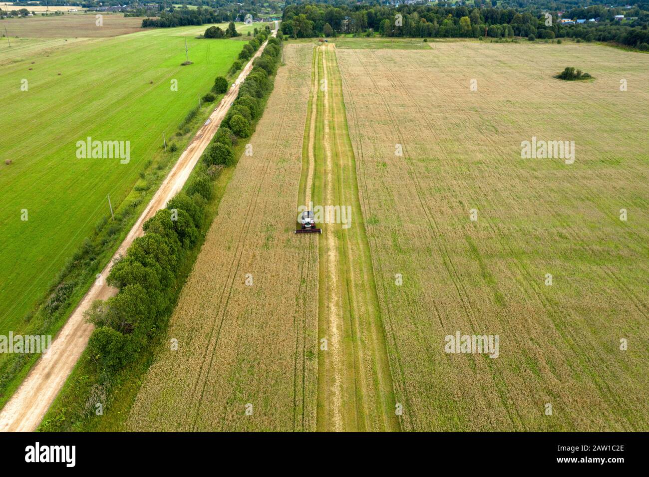 Harvester in field sunset aerial hi-res stock photography and images ...
