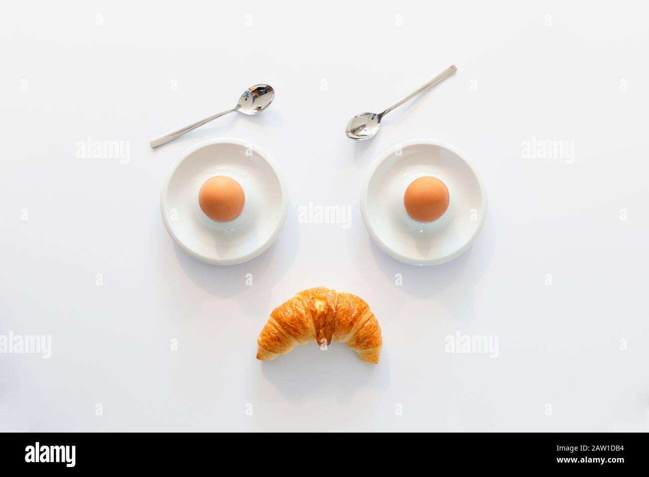 Fun breakfast concept with abstract angry grumpy human face made of ...
