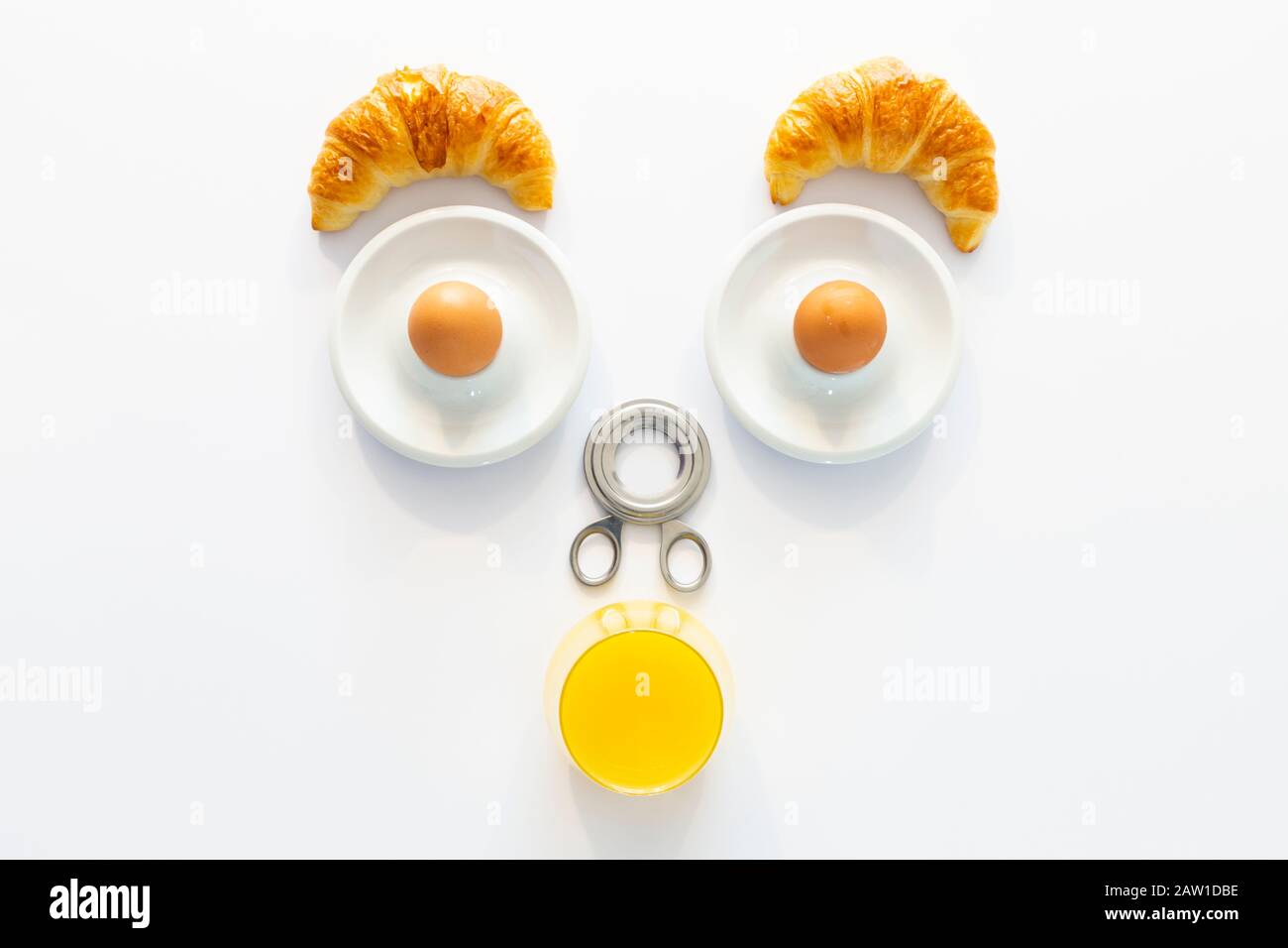 Fun breakfast concept with abstract astonished human face made of ...