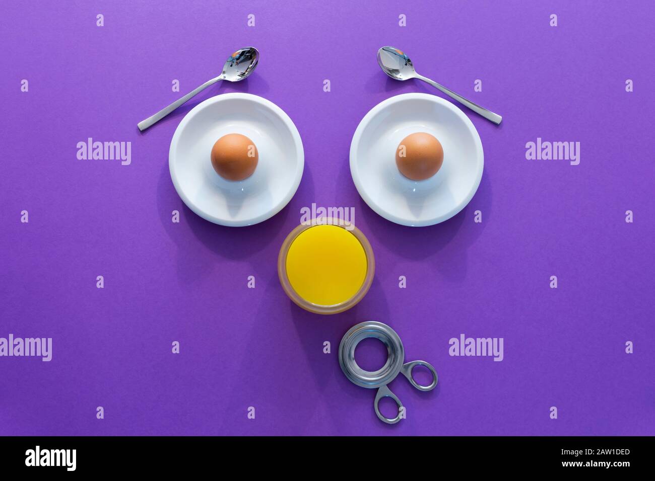 Fun breakfast concept with abstract astonished human face made of ...